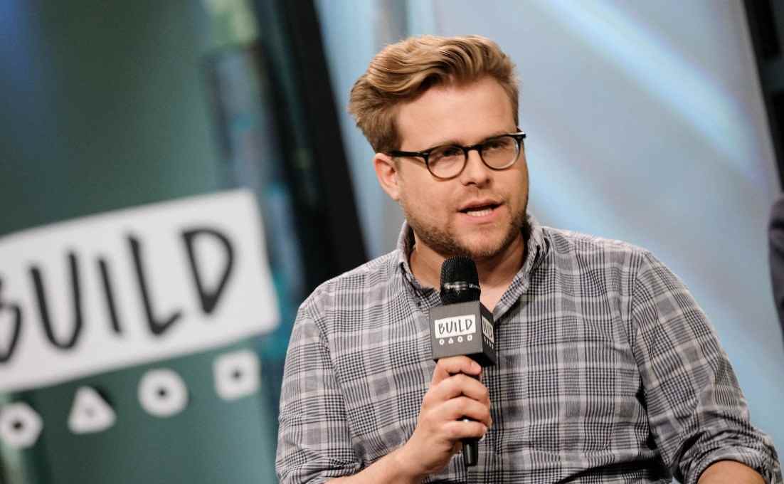 Adam Conover Net Worth 2025: How the Comedian Built His Fortune? - AMJ